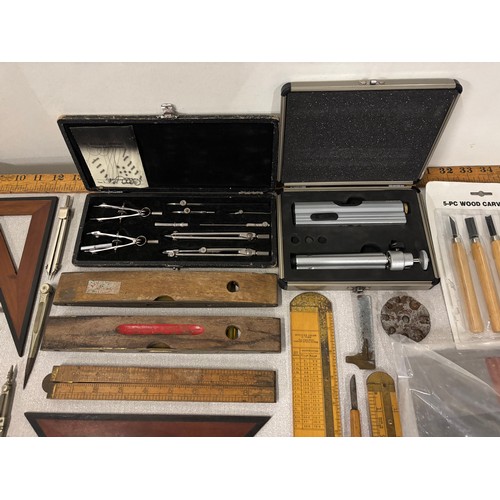 Selection of drafting tools, magnifiers & old spirit levels etc.