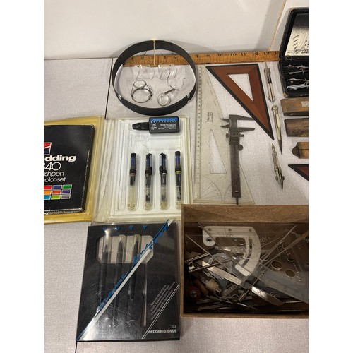Selection of drafting tools, magnifiers & old spirit levels etc.