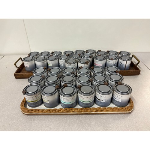 quantity of 40 different colour small tins of paint