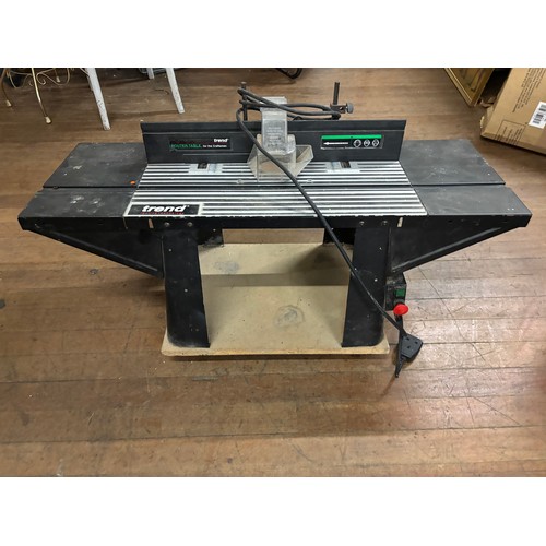 Trend router table along with bag of accessories for table.