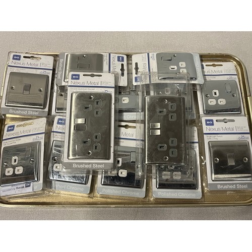 Qty of new Nexus metal sockets and light switches.