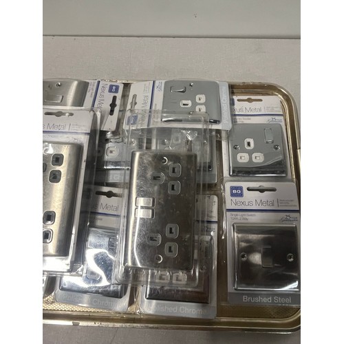 Qty of new Nexus metal sockets and light switches.