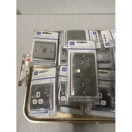 Qty of new Nexus metal sockets and light switches.