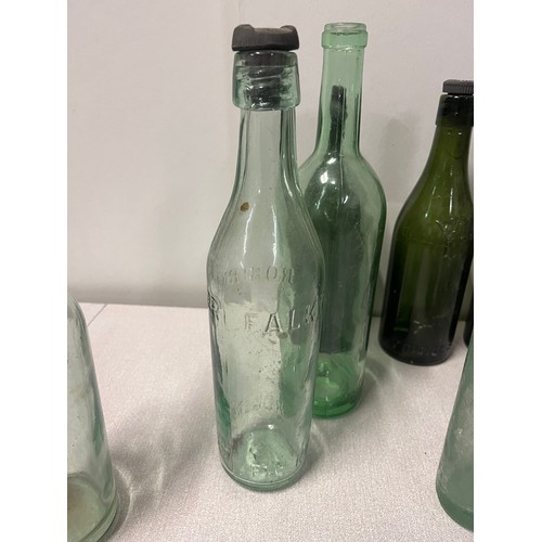 Collection of antique Scottish glass bottles to include Highland ...