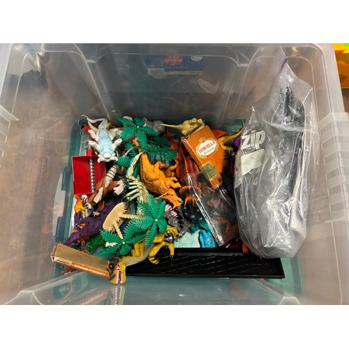 Large selection of assorted toys to include toy cars, dinosaurs, fisher ...