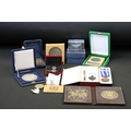 A collection of military collectables to include medals, medallions ...