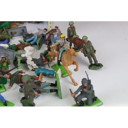 Around 65 plastic figures, mostly Britains Deetail soldier figures ...