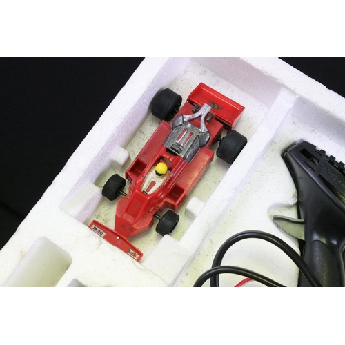 Collection of various Scalextric slot car racing related items to ...