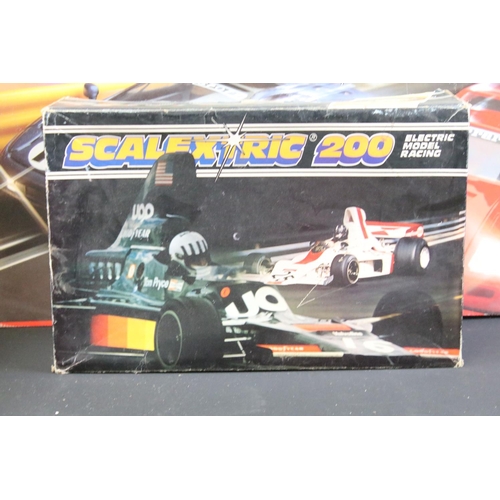 Collection of various Scalextric slot car racing related items to ...