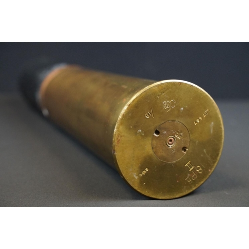 An 18lb shell brass shell case complete with fuse end.