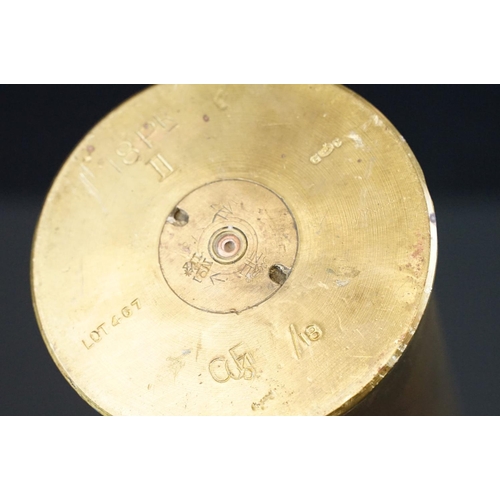 An 18lb shell brass shell case complete with fuse end.