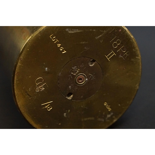 An 18lb shell brass shell case complete with fuse end.