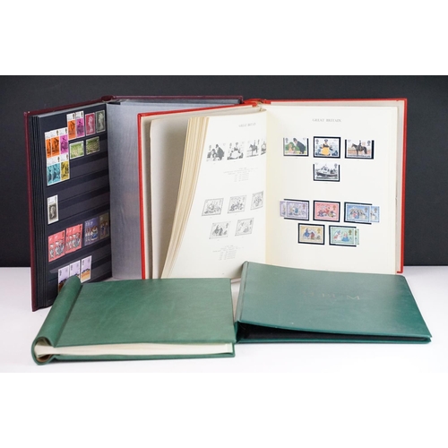 Four albums of British stamps to include two Stanley Gibbons Windsor ...