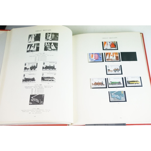 Four albums of British stamps to include two Stanley Gibbons Windsor ...