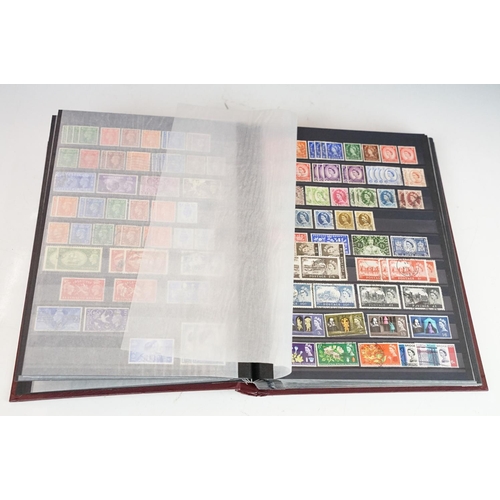 Four albums of British stamps to include two Stanley Gibbons Windsor ...