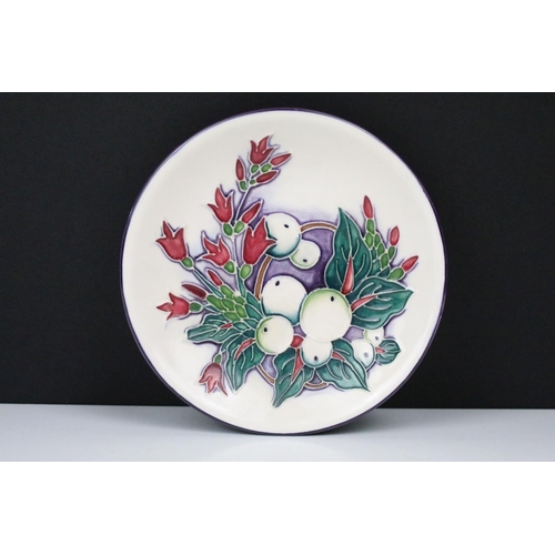 Four boxed Moorcroft pottery pin dishes to include True Blue, Snowberry ...