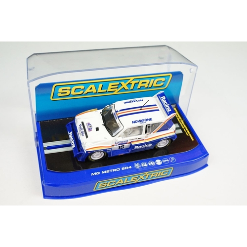Five cased Scalextric Slot cars featuring C3408 MG Metro 6R4 NO.15 ...