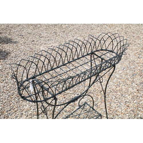 Wirework garden plater stand having an oval stand to top raised on ...