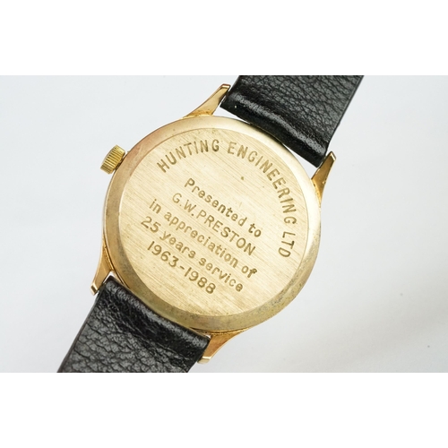 A vintage gents Garrard 9ct gold cased gents mechanical wristwatch with ...