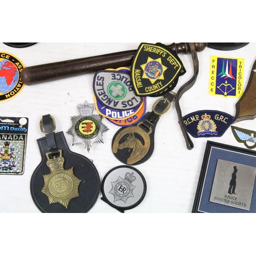 Assortment of vintage British and foreign Police collectables to ...