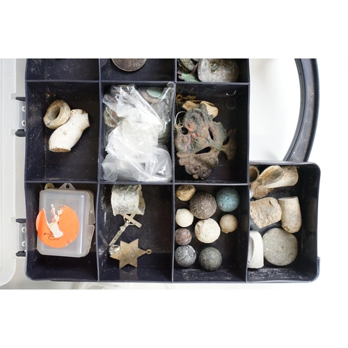 A collection of metal detecting finds to include coins, keys, musket ...