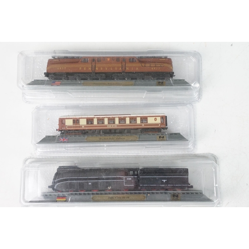 Around 36 Del Prado N gauge locomotives on stands, mainly contained ...
