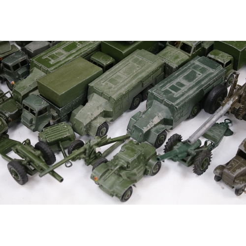 Around 70 Mid 20th C playworn military diecast models to include Dinky ...