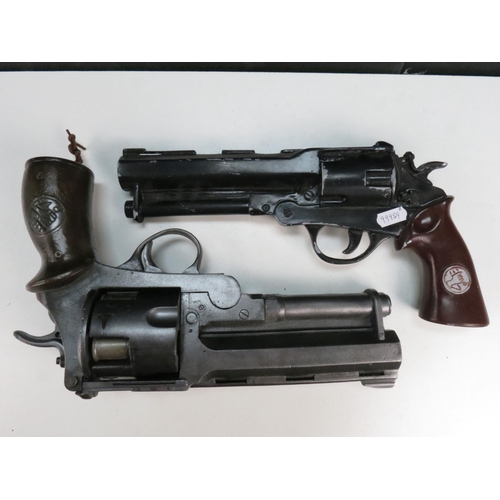 Two custom made Hellboy Good Samaritan guns, showing some paint wear ...