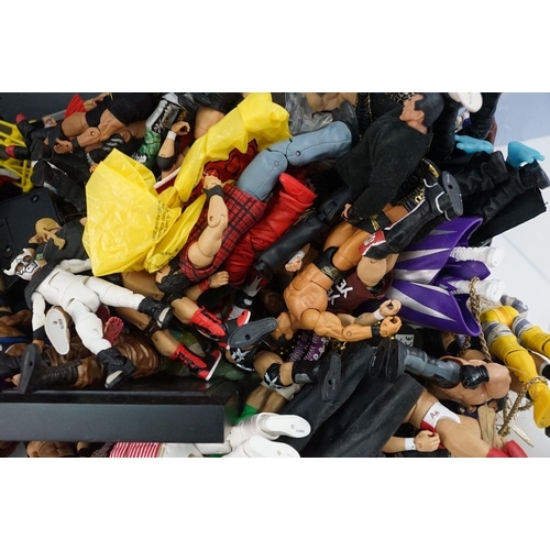 Large collection of mainly Mattel WWE / WWF action figures featuring ...