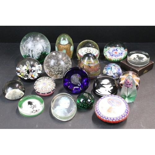 A collection of antique and vintage glass paperweights to include ...
