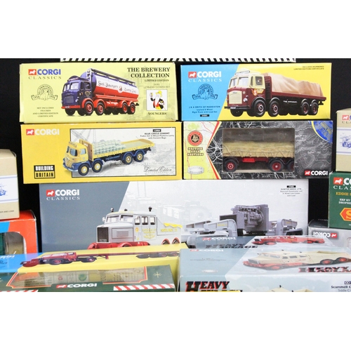 21 Boxed diecast models to include 3 x Corgi Heavy Haulage models ...