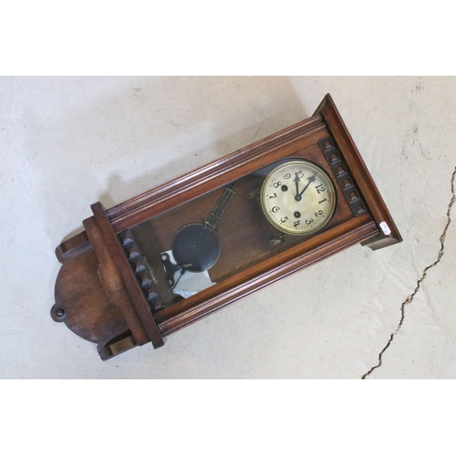 Antique regulator wall clock including pendulum and key
