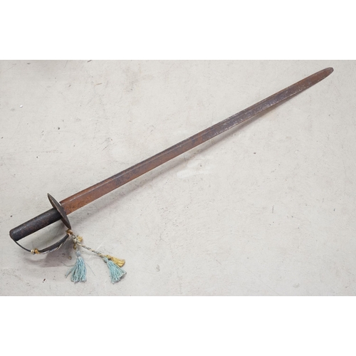 19th century Sword, with wrought iron hand guard, blade indistinctly ...