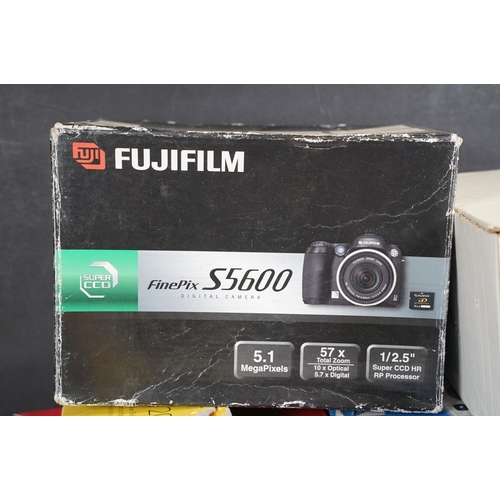 A large collection of digital and film cameras to include Sony, Canon ...