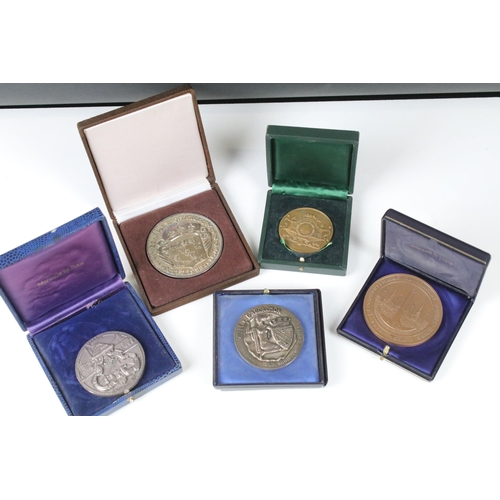 Five cased French medallions