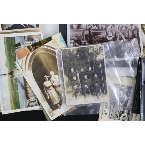 A collection of early to late 20th century postcards to include printed ...
