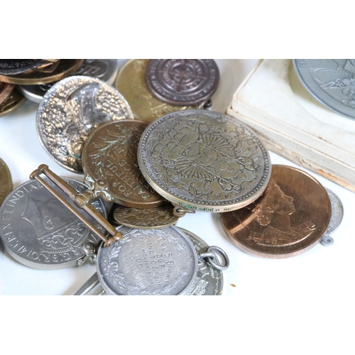 A collection of mixed medals and medallions to include military, 19th ...