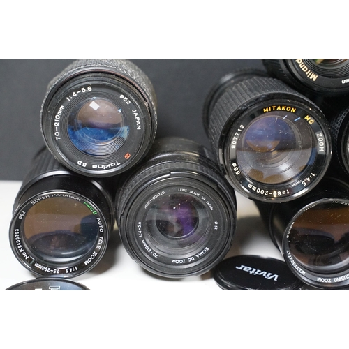 Collection of camera lenses to include Vivitar, Photax Super Paragon ...