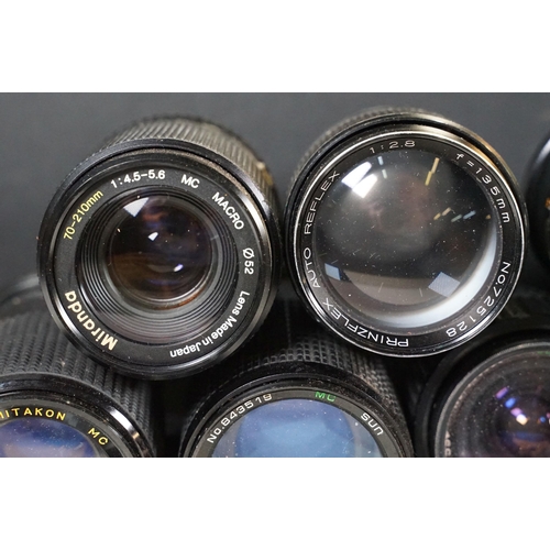 Collection of camera lenses to include Vivitar, Photax Super Paragon ...