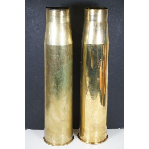 Pair of 4.5 Pound Spent artillery shells, measures 69.5cm tall
