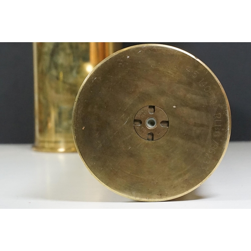 Pair of 4.5 Pound Spent artillery shells, measures 69.5cm tall