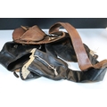 4 sword bags including a brown leather sword bag with a cloth label ...