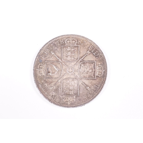 A British Queen Victoria 1889 gold full sovereign coin together with a ...