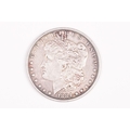 A United States of America 1884 silver Morgan dollar coin.