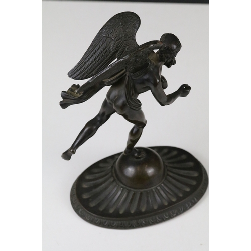 An early 19th century Bronze of the Greek god Cronos (Saturn), stands ...