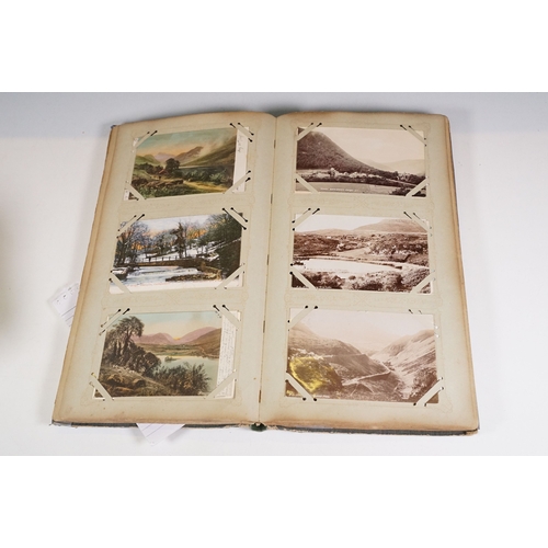 A large collection of mainly early 20th century postcards to include real photo, printed and silk ex