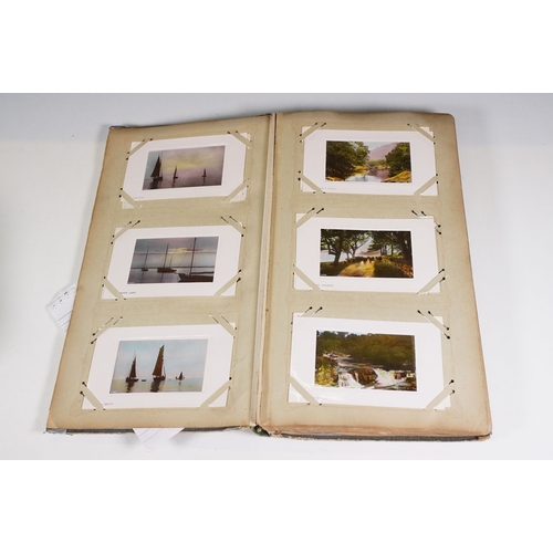 A large collection of mainly early 20th century postcards to include real photo, printed and silk ex