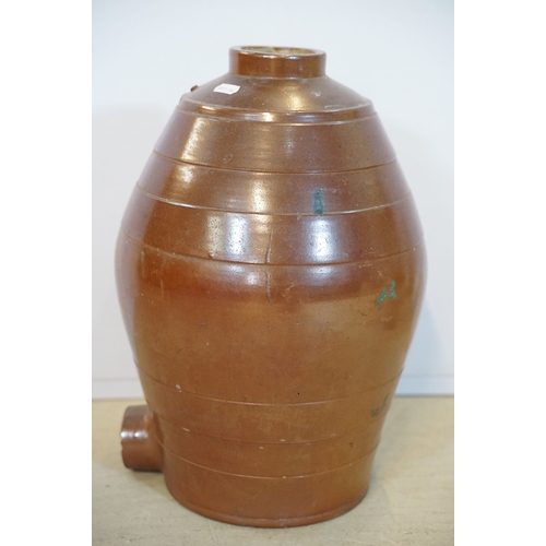 Two glazed stoneware flagon and storage jar including H.B.Skeates Wine ...