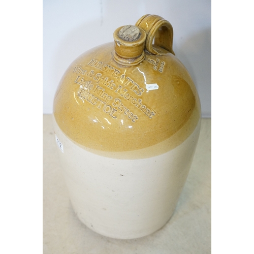 Two glazed stoneware flagon and storage jar including H.B.Skeates Wine ...