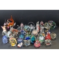 A quantity of novelty Paperweights, comprising examples in the shapes ...